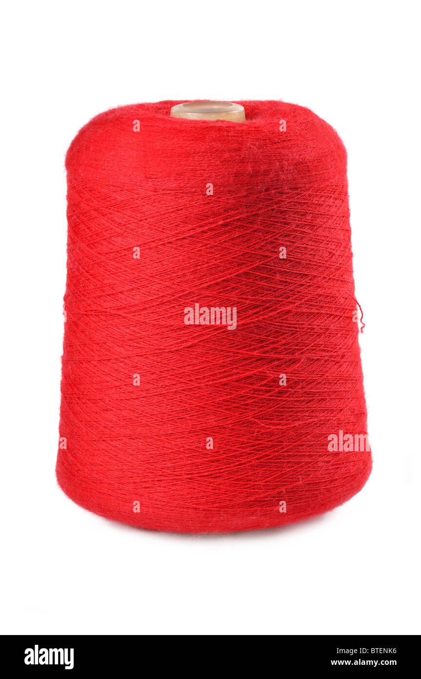 spool of thread for knitting on a white background Stock Photo - Alamy