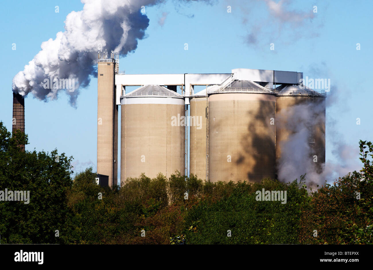 Sugar factory storage silos Stock Photo - Alamy