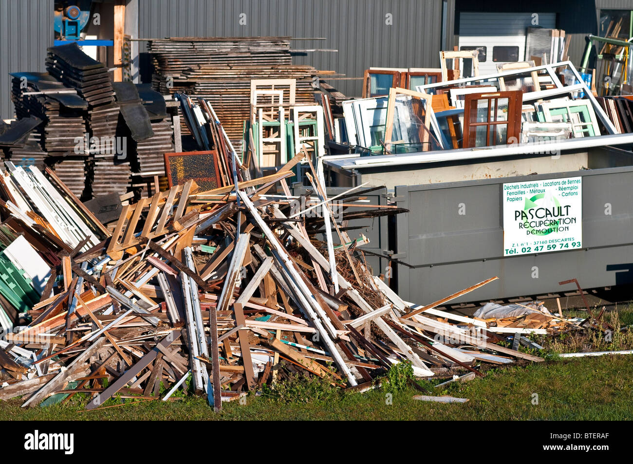 Stack of waste timber and doors on industrial estate - France Stock ...