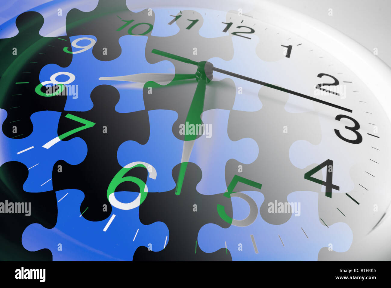 Clock and Jigsaw Puzzle Stock Photo - Alamy