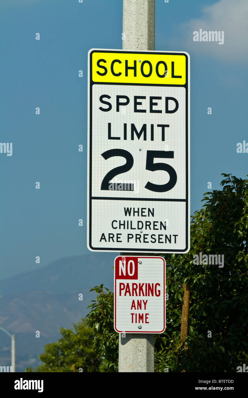 School speed limit and no parking any time sign Stock Photo - Alamy