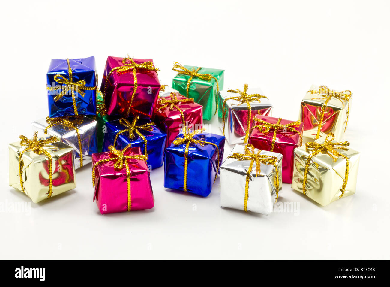 Colorful presents isolated on white Stock Photo - Alamy