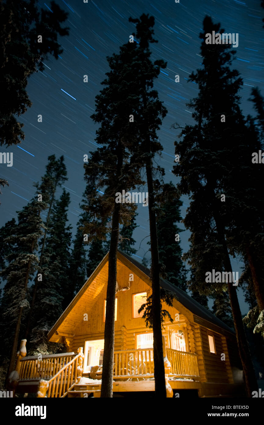 Log cabin and star trails, Kusawa Lake, Yukon Stock Photo - Alamy