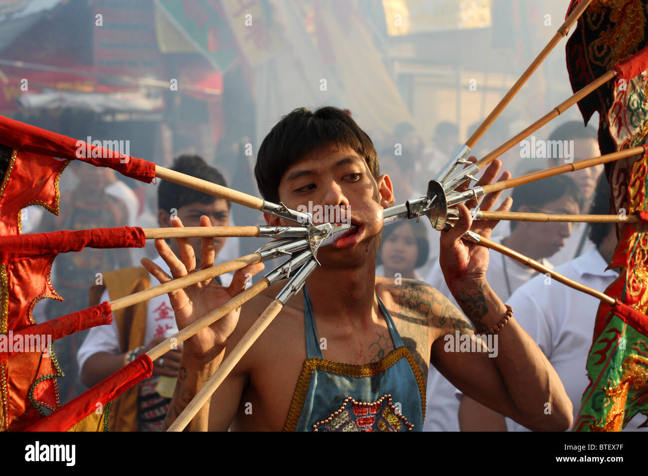 Skewer piercing phuket vegetarian festival hi-res stock photography and ...