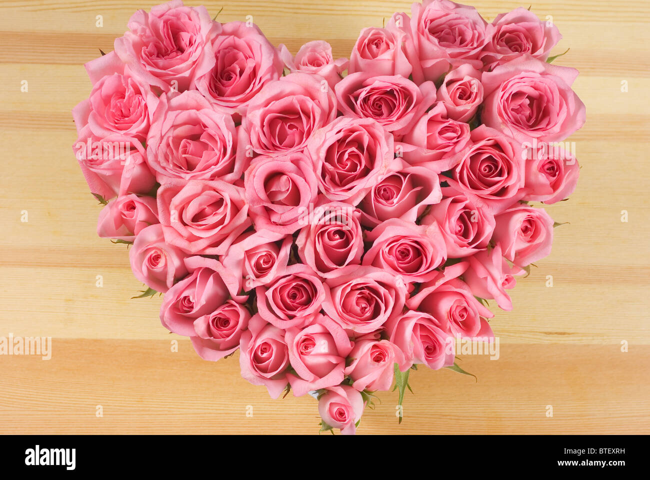 Roses in Love Shape Stock Photo - Alamy