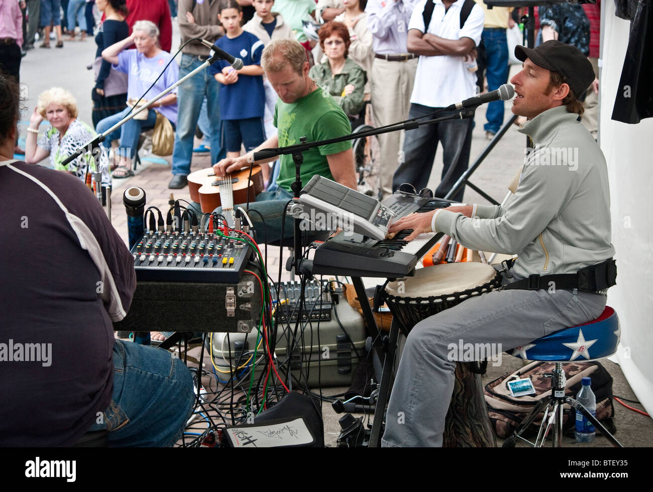 Australian band OKA performing outdoors at the Toronto Buskerfest ...