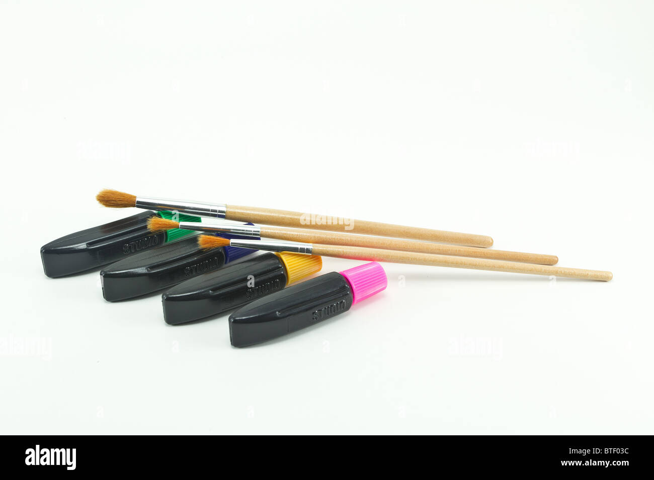 Colors and brush on white background Stock Photo - Alamy