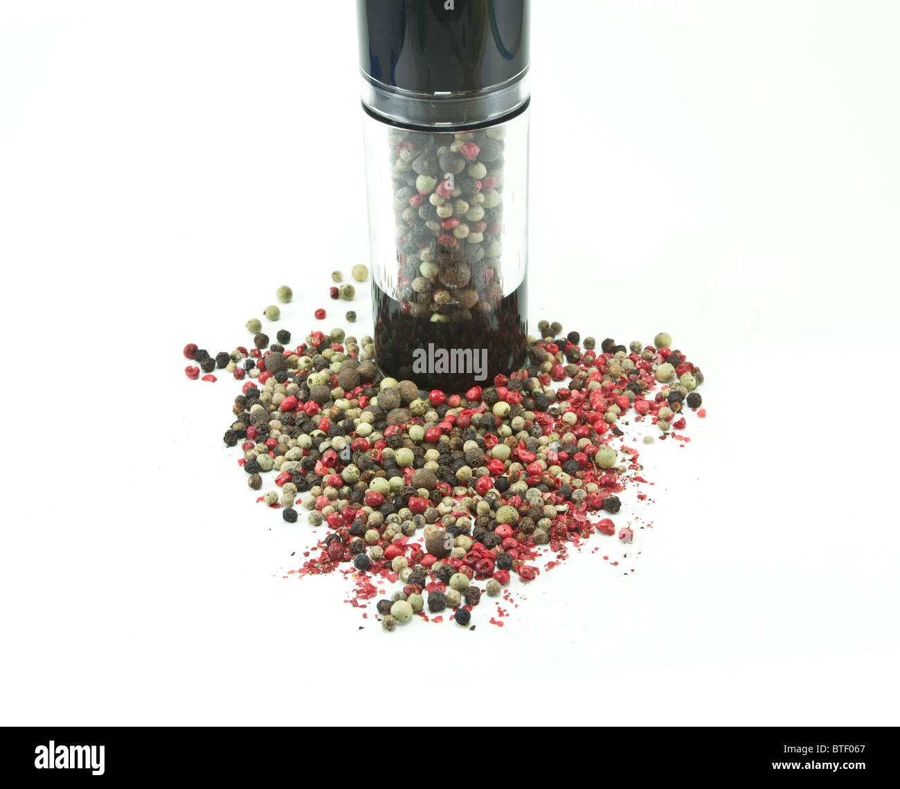 Closeup of mixed pepper isolated on white background Stock Photo - Alamy