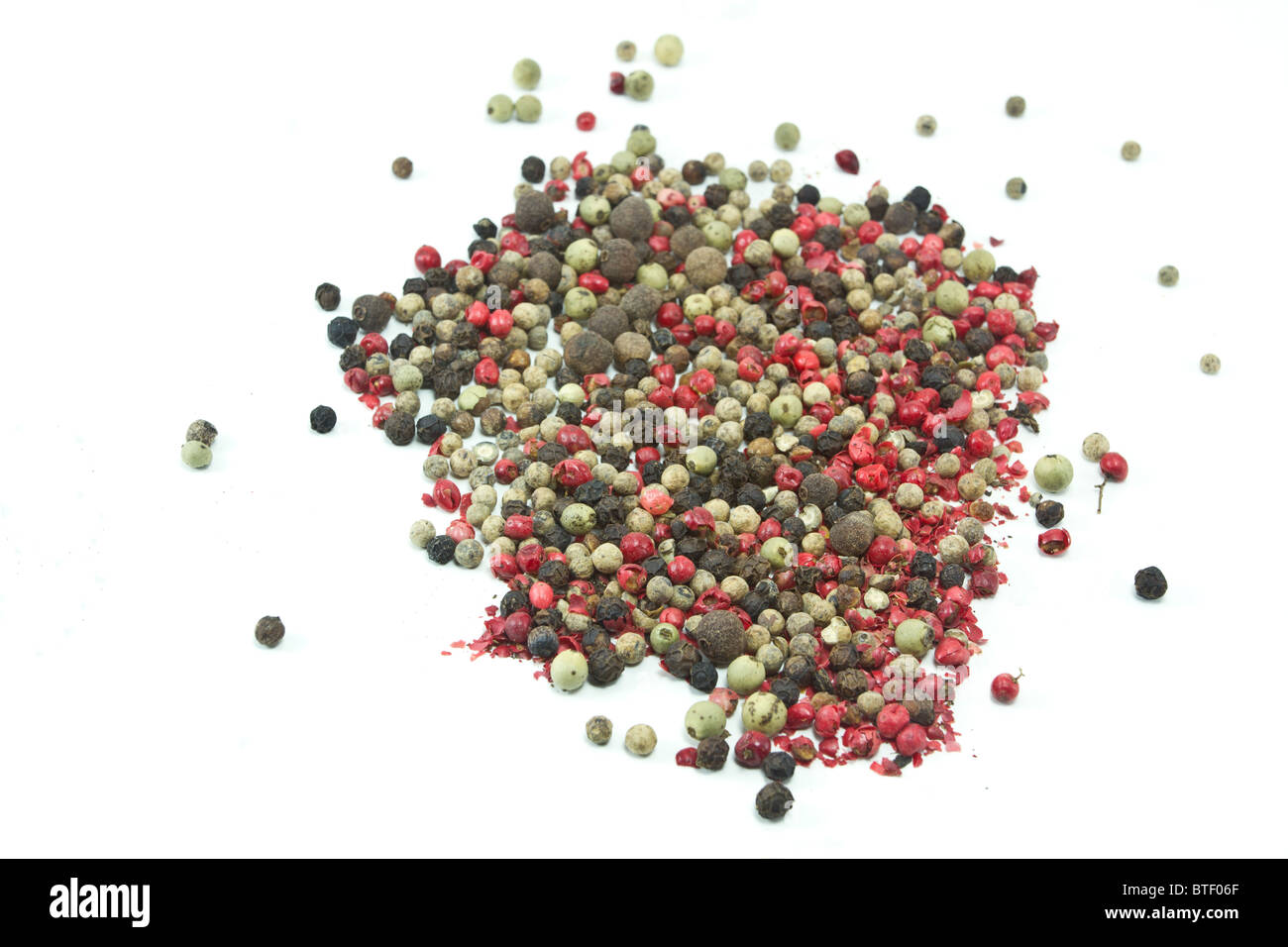 Closeup of mixed pepper isolated on white background Stock Photo - Alamy