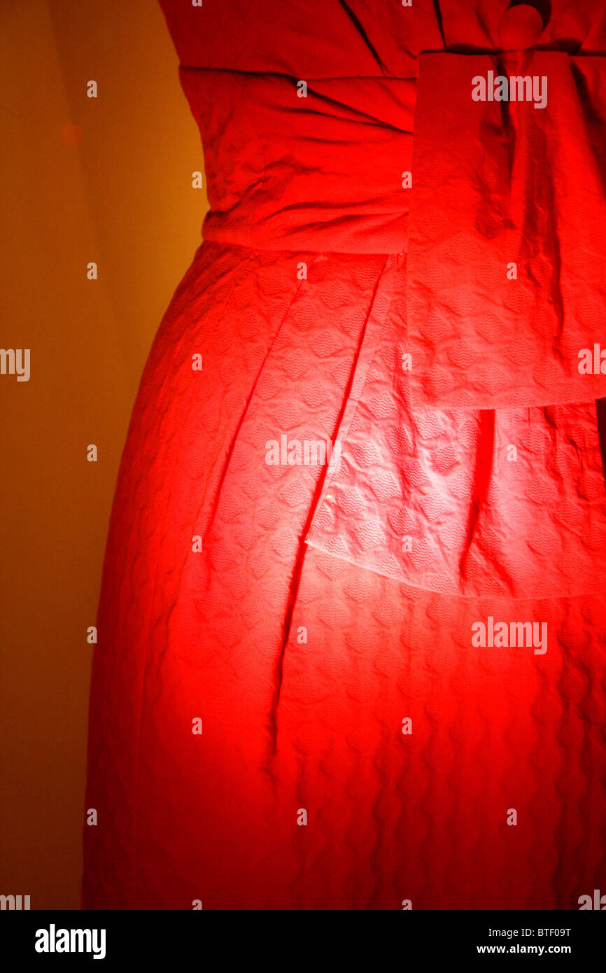 detail of red dress in shop window at night, rome Stock Photo - Alamy
