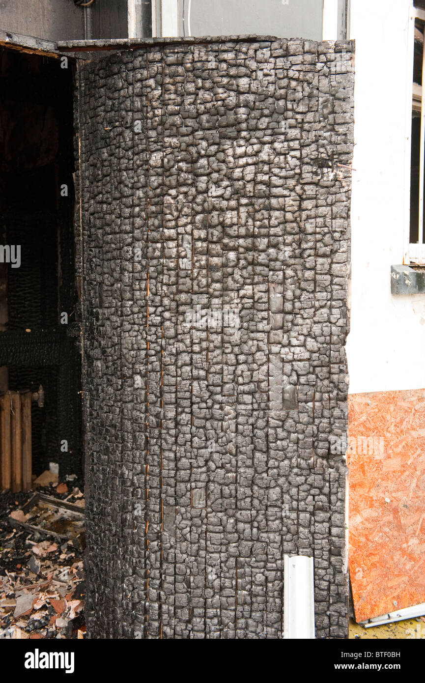 Fire door extensively burnt at fire Stock Photo - Alamy