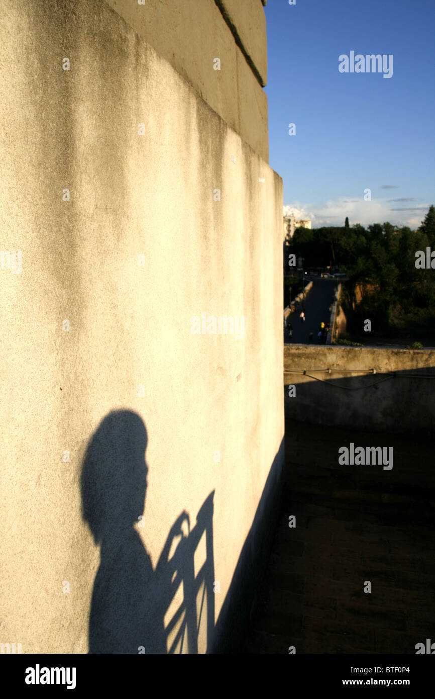 Person in shadow walking out hi-res stock photography and images - Alamy