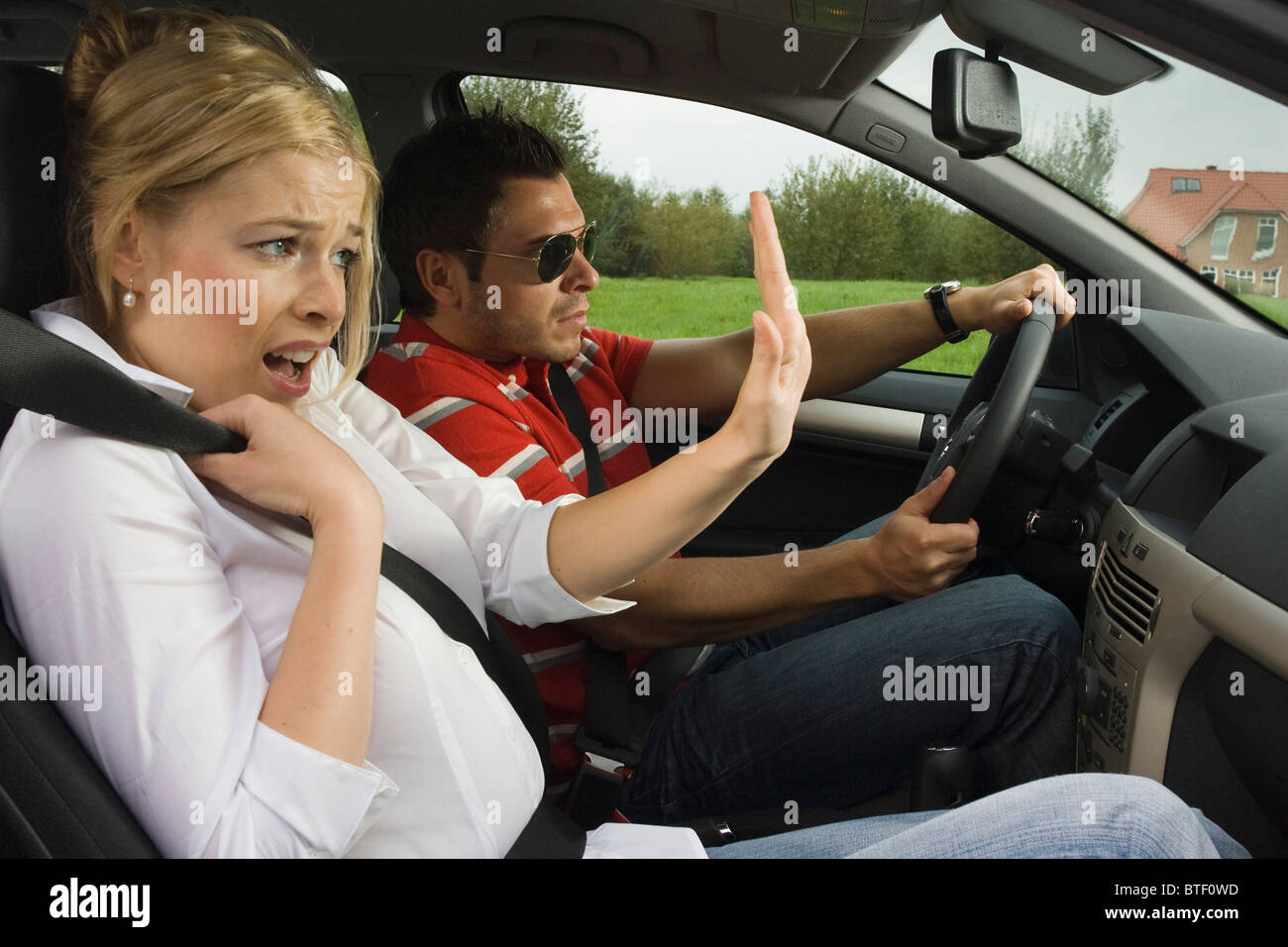 Man driving woman scared hi-res stock photography and images - Alamy