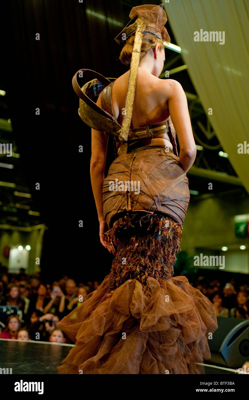 Fashion model showing chocolate dress hi-res stock photography and ...