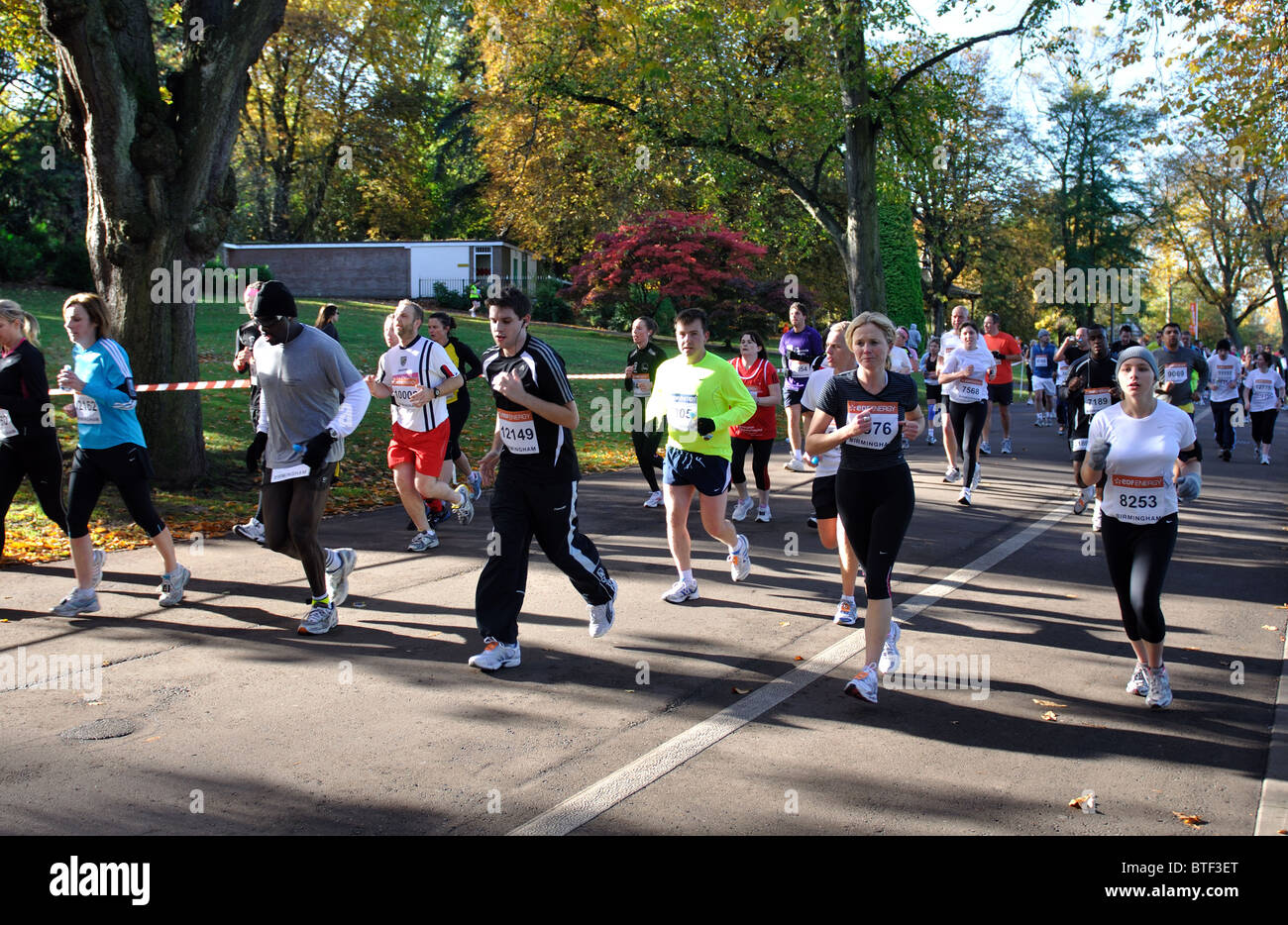 Runners in Birmingham Half Marathon race in Cannon Hill Park Stock ...