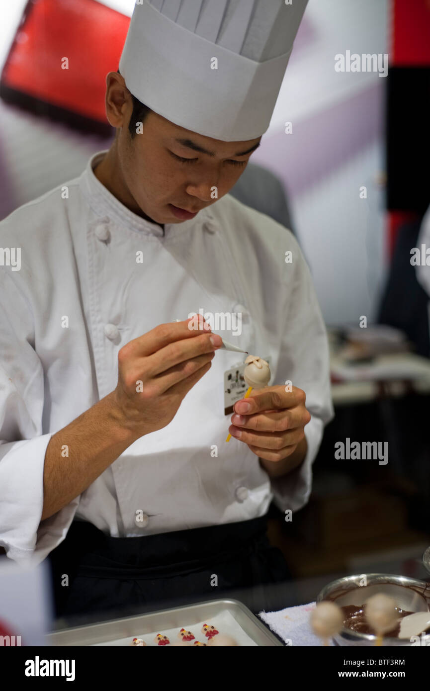 Preparing chocolates salon du chocolat hi-res stock photography and ...