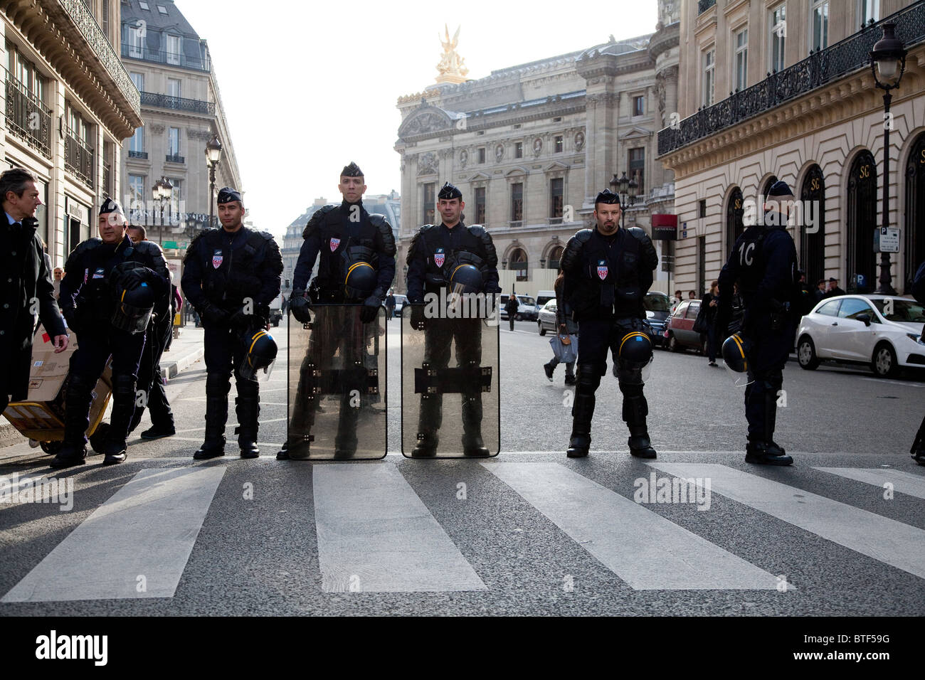 French riot police the CRS block the side streets along route of rally ...