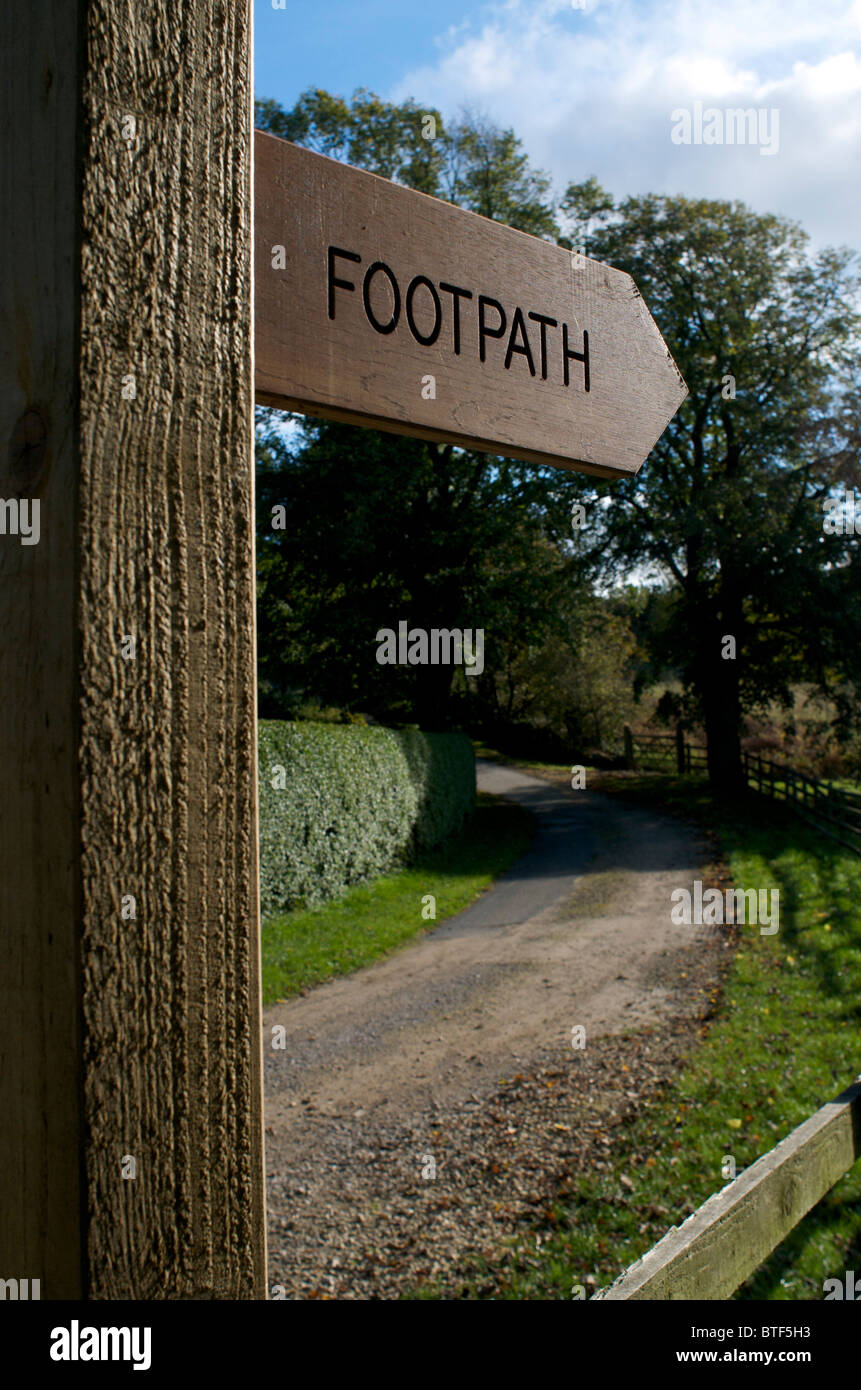 sign showing way to footpath Stock Photo - Alamy