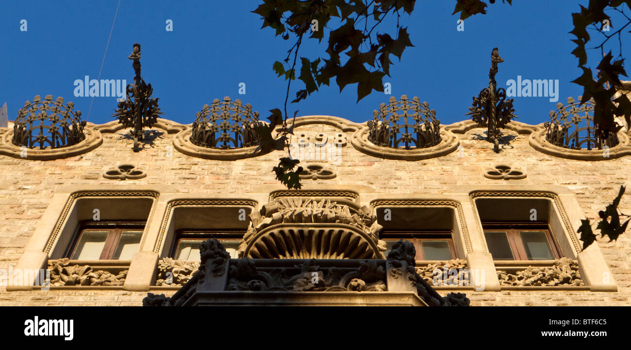 Detail of architecture - 1898 stone building against a clear blue sky ...
