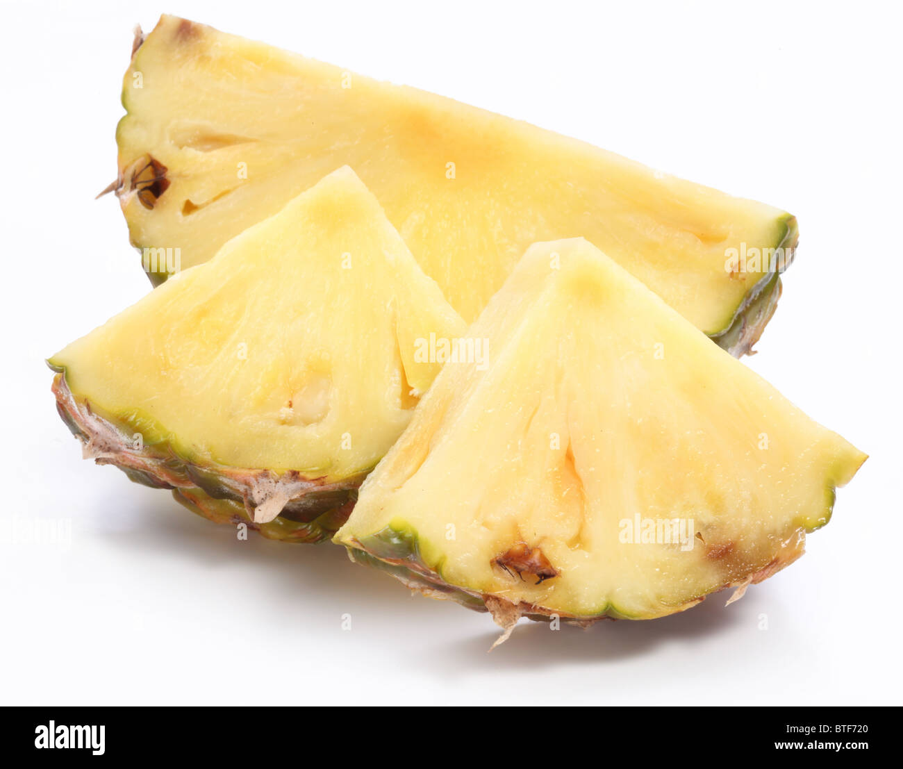 Cuts of pineapple. Isolated on a white background Stock Photo - Alamy