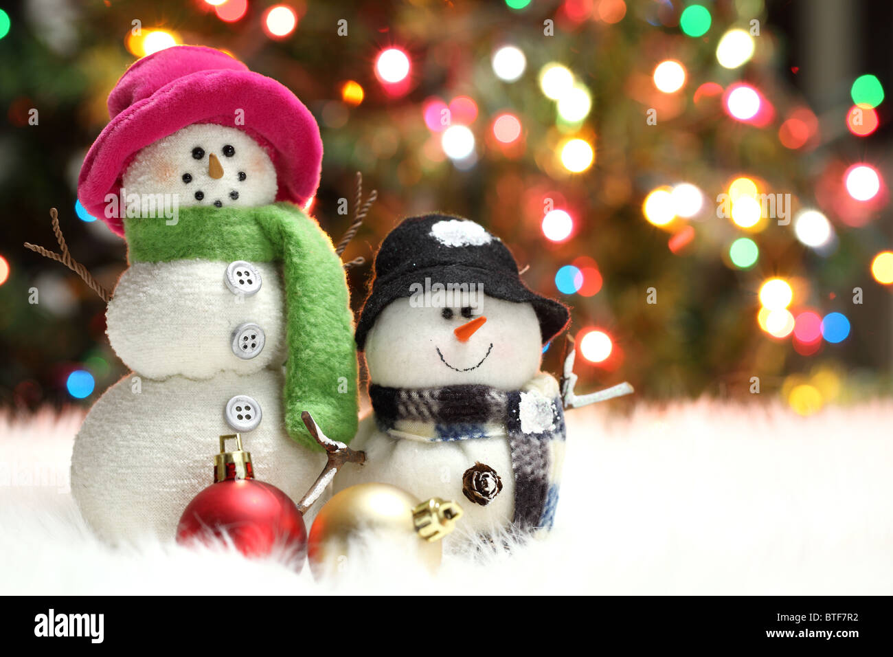 Festive snowman with Christmas light background Stock Photo - Alamy