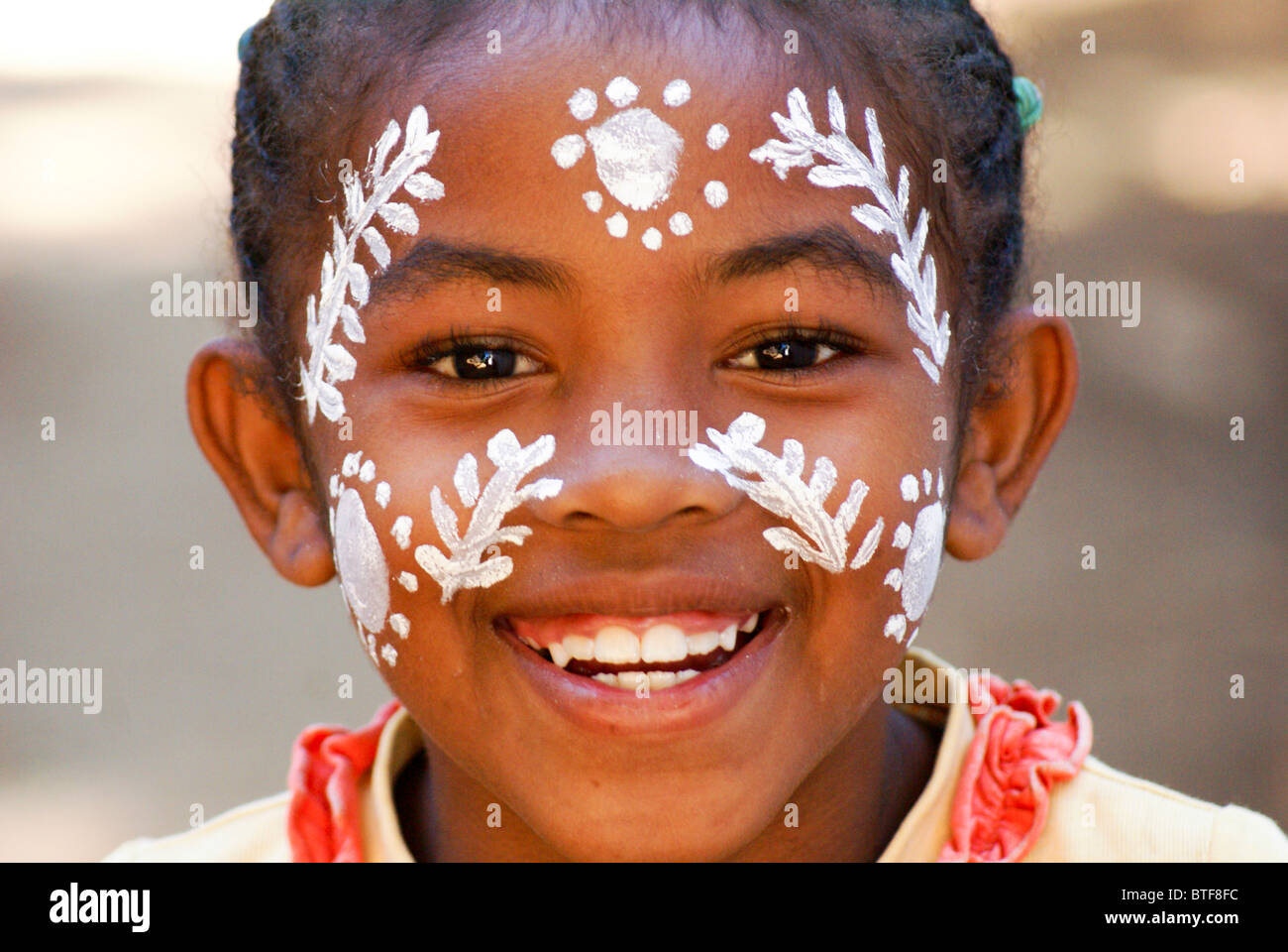 Madagascar, Nosy Komba Island Child with painted face Stock Photo - Alamy