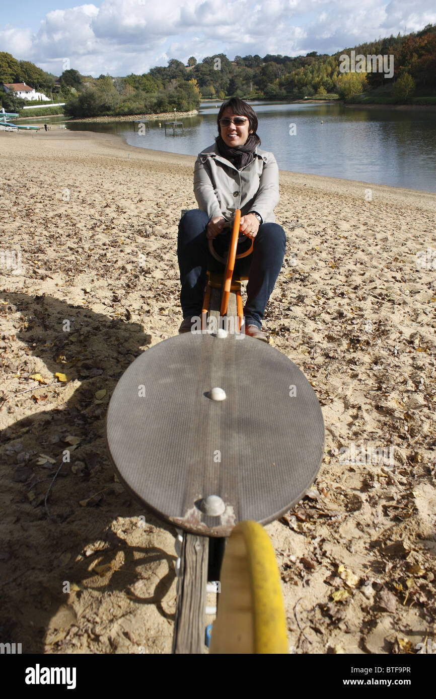Woman playing the saw hi-res stock photography and images - Alamy