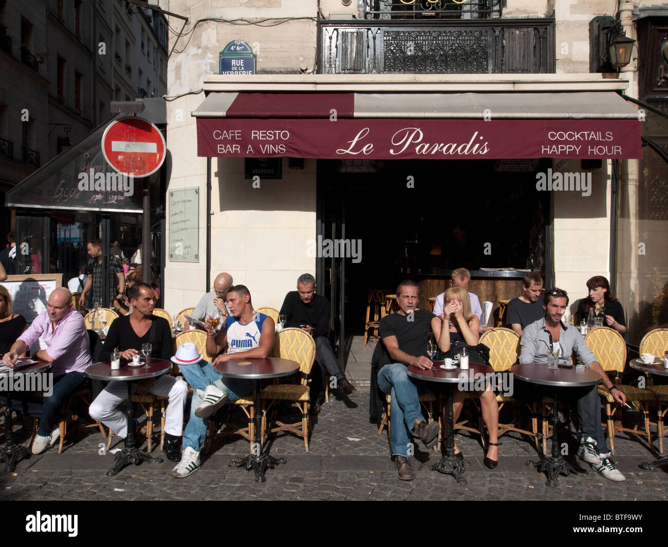 Typical busy pavement cafe in the Marais district of Paris France Stock ...