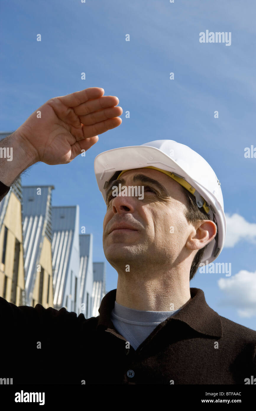 Building contractor in hard hat Stock Photo - Alamy