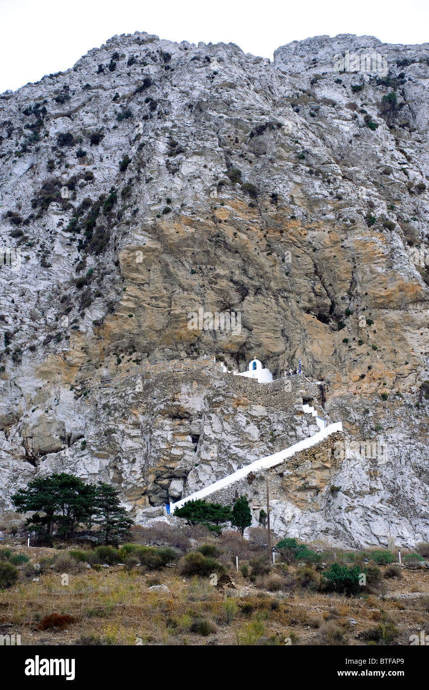 Small Greek Orthodox church built into a cliff face near Aegiali, on ...