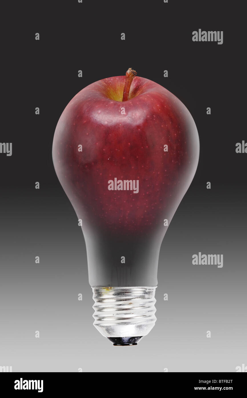 Light bulb with red apple inside Stock Photo - Alamy