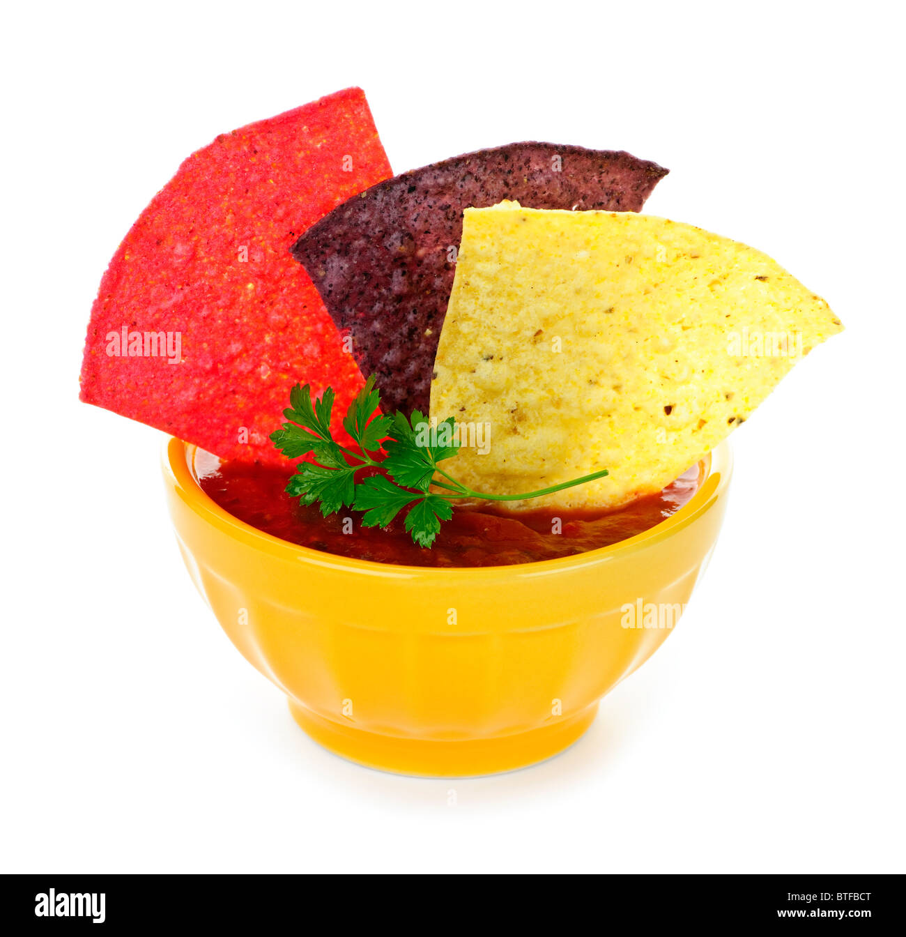 Bowl of salsa with colorful tortilla chips isolated on white background ...