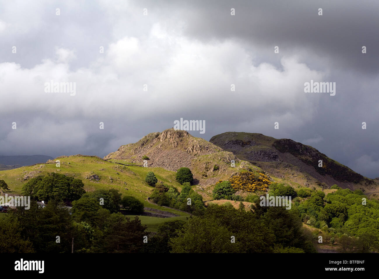 Grey clouds above Eskdale Fell Boot Eskdale Lake District National Park ...