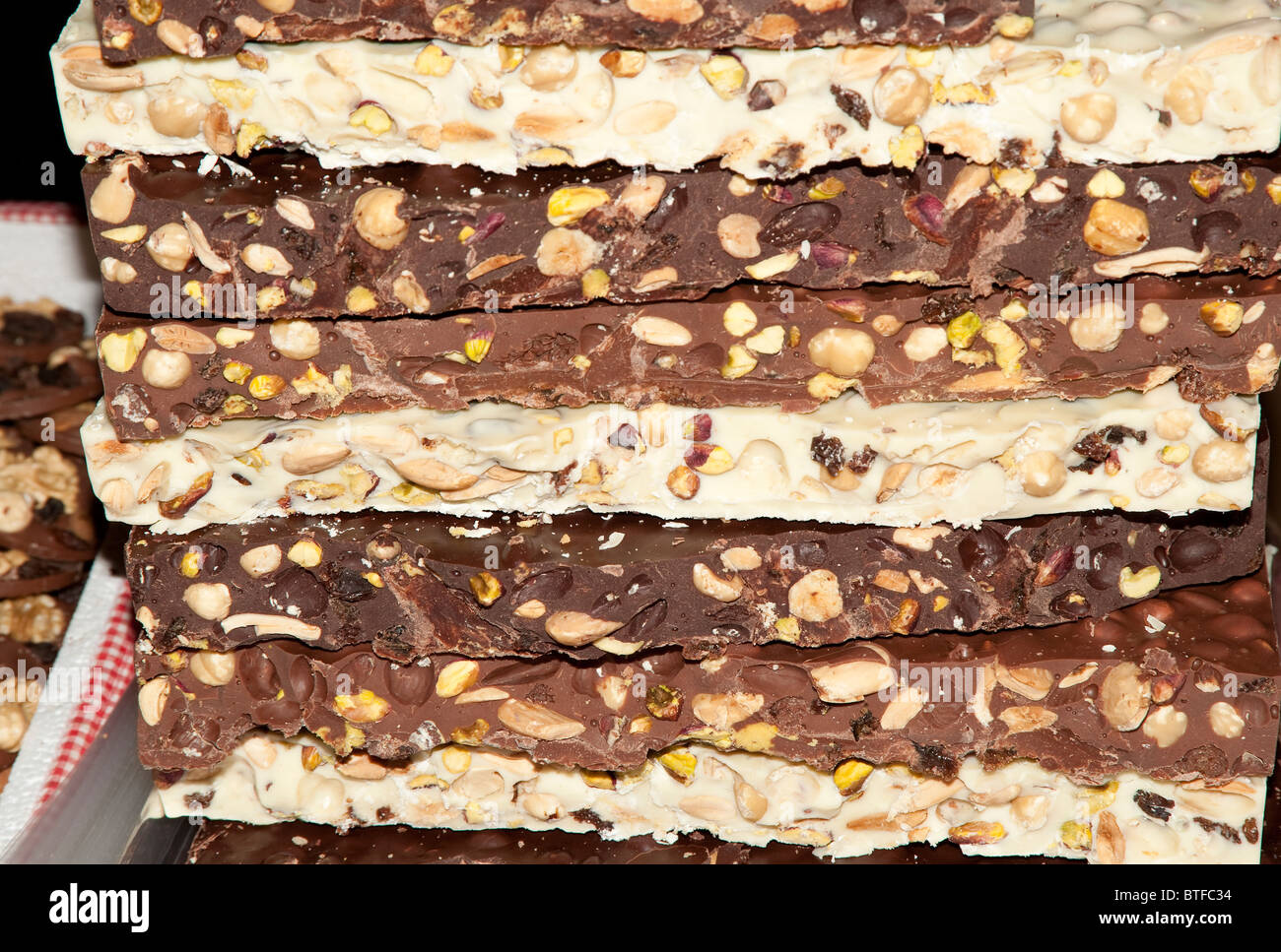 Stack of nuts chocolates on display at Paris "Salon du Chocolate ...