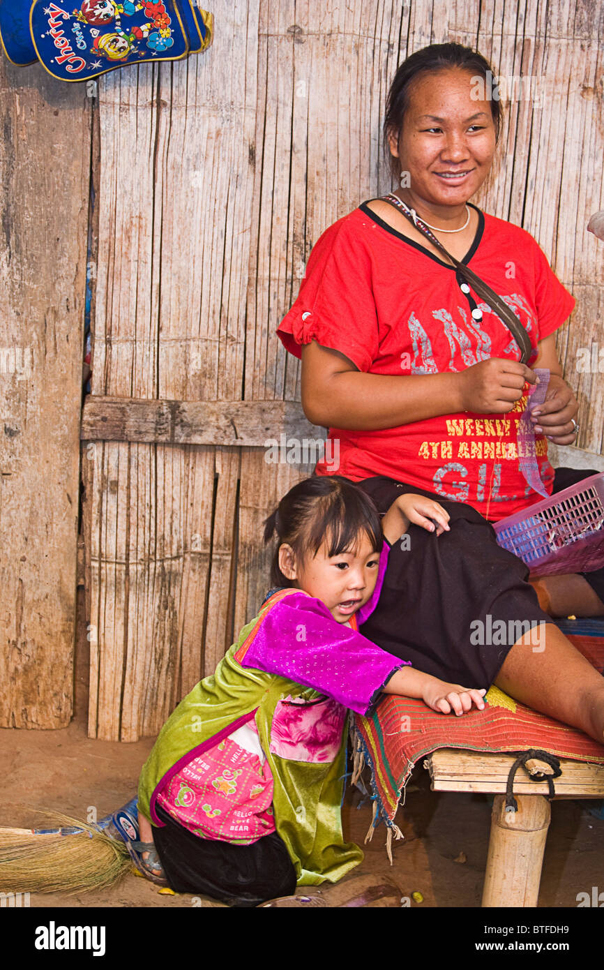 Lisu tribal woman, about 25, with her girl child, about 3 in Lisu ...