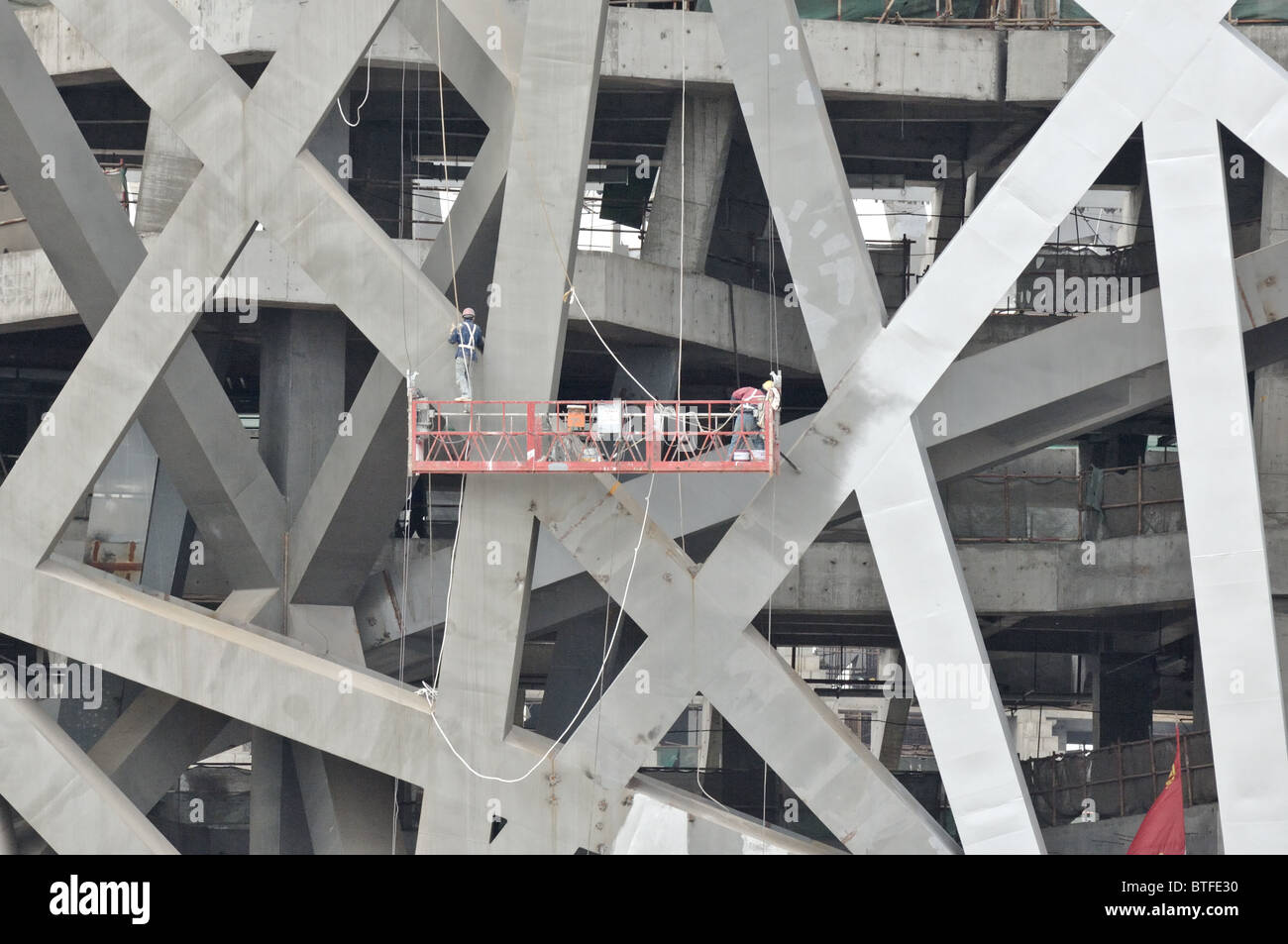 Beijing Olympic Stadium Bird's Nest during its construction Stock Photo ...