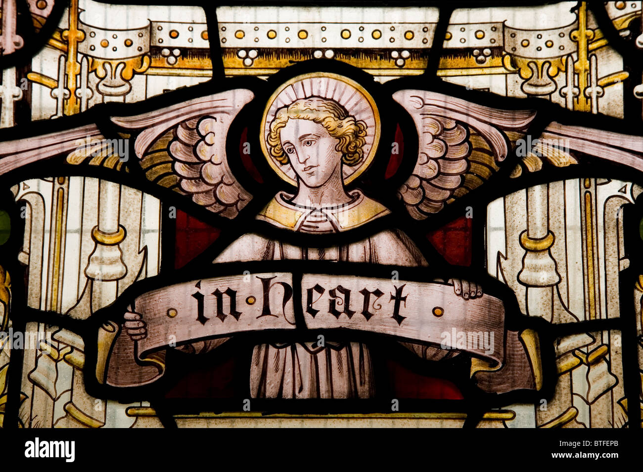 Stained glass window depicting Angel holding banner inside St Nicholas ...
