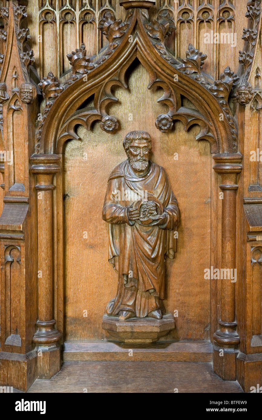 Religious wood carving of St Peter on the Pulpit at St Nicholas Church ...