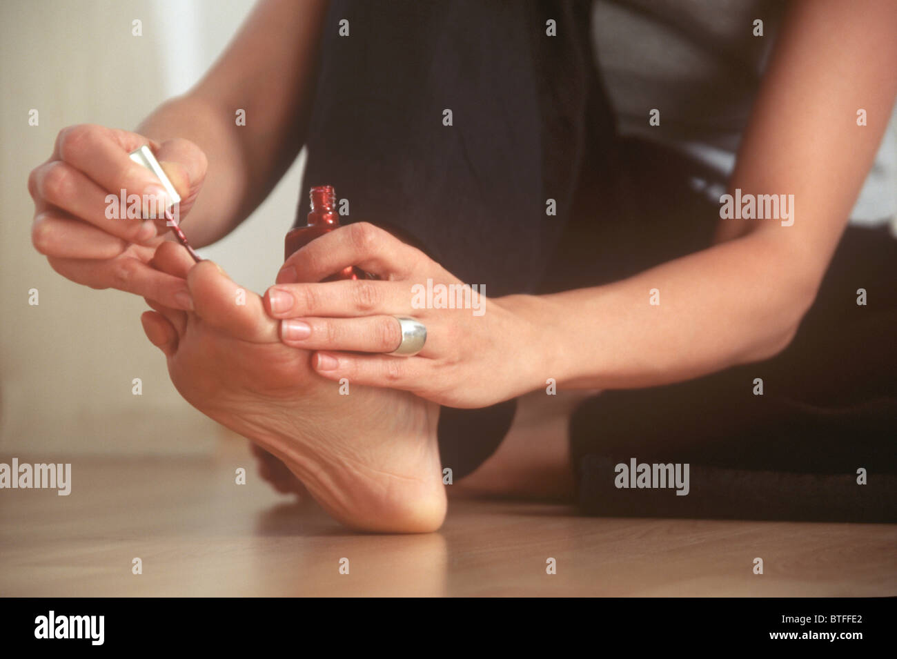 Woman feet red toenails on hi-res stock photography and images - Alamy
