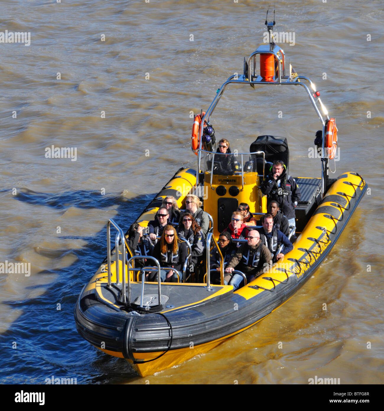 Tourist guide and passengers on Thames Rib Experience high speed tour ...