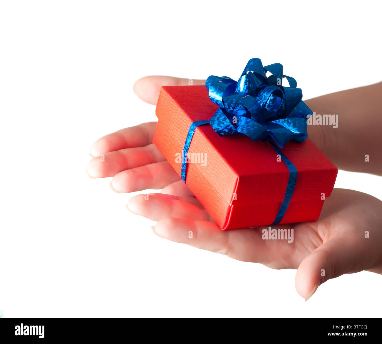Hands giving a gift isoated Stock Photo - Alamy