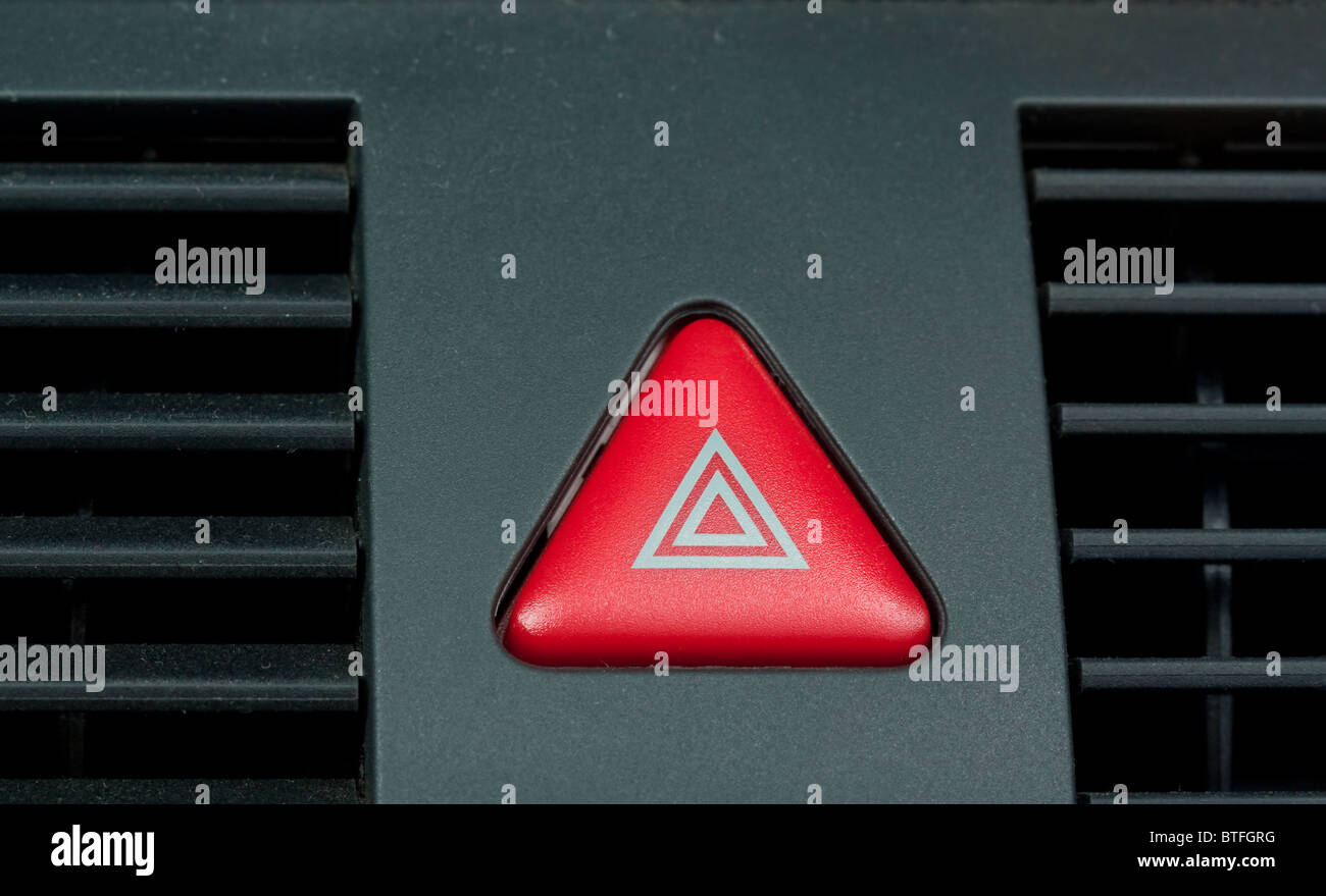Emergency button on car panel Stock Photo - Alamy