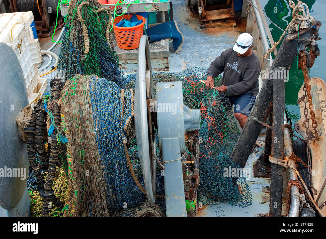 Damaged fishing nets hi-res stock photography and images - Alamy