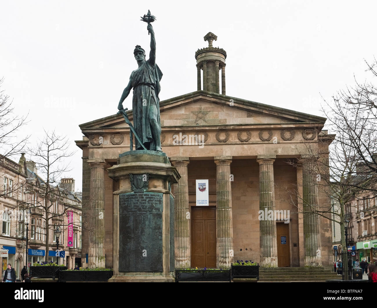 St Giles Church with the War Memorial. Statue of Victory and Peace by ...