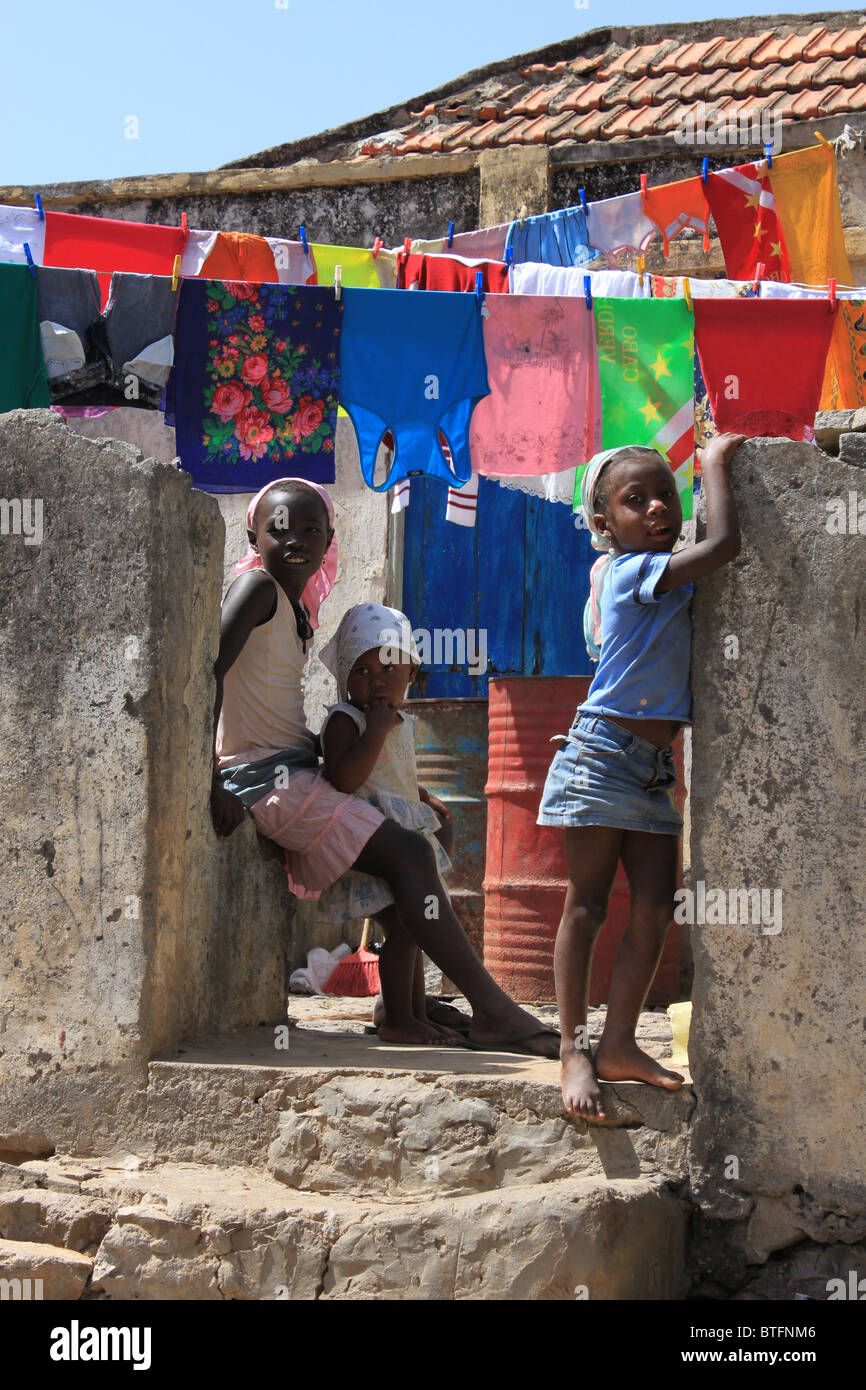 Colorful washing line with Cape Verdian children Stock Photo - Alamy