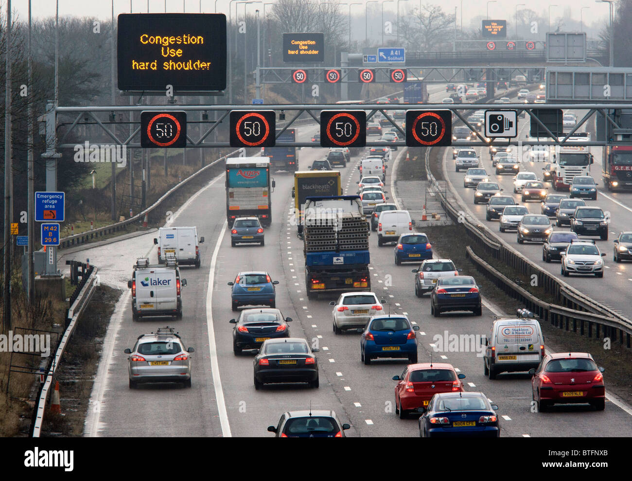 Congestion use hard shoulder sign hi-res stock photography and images ...