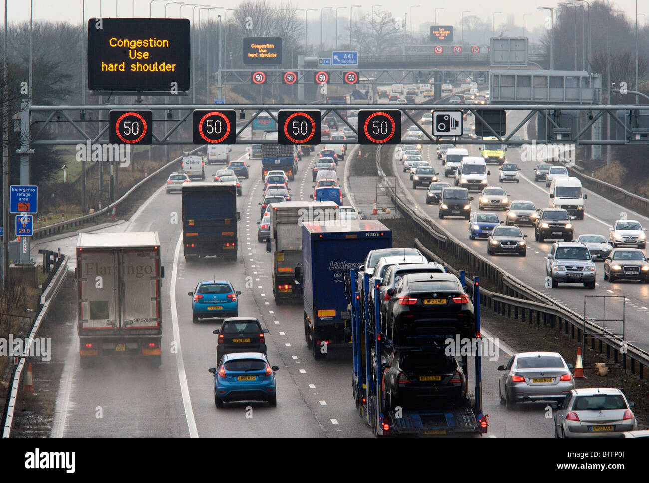 Signage on the M42 motorway in the West Midlands advising motorists to ...