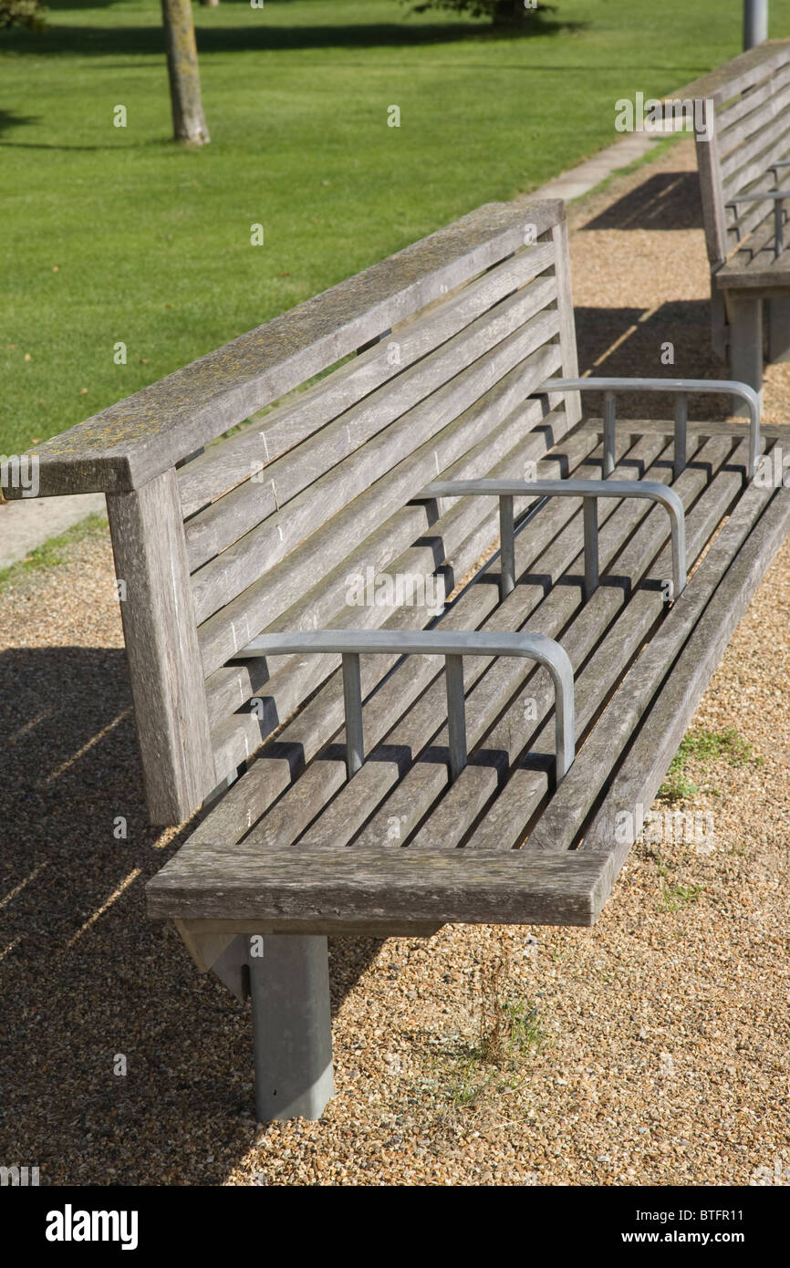 Wooden bench in a park Stock Photo - Alamy