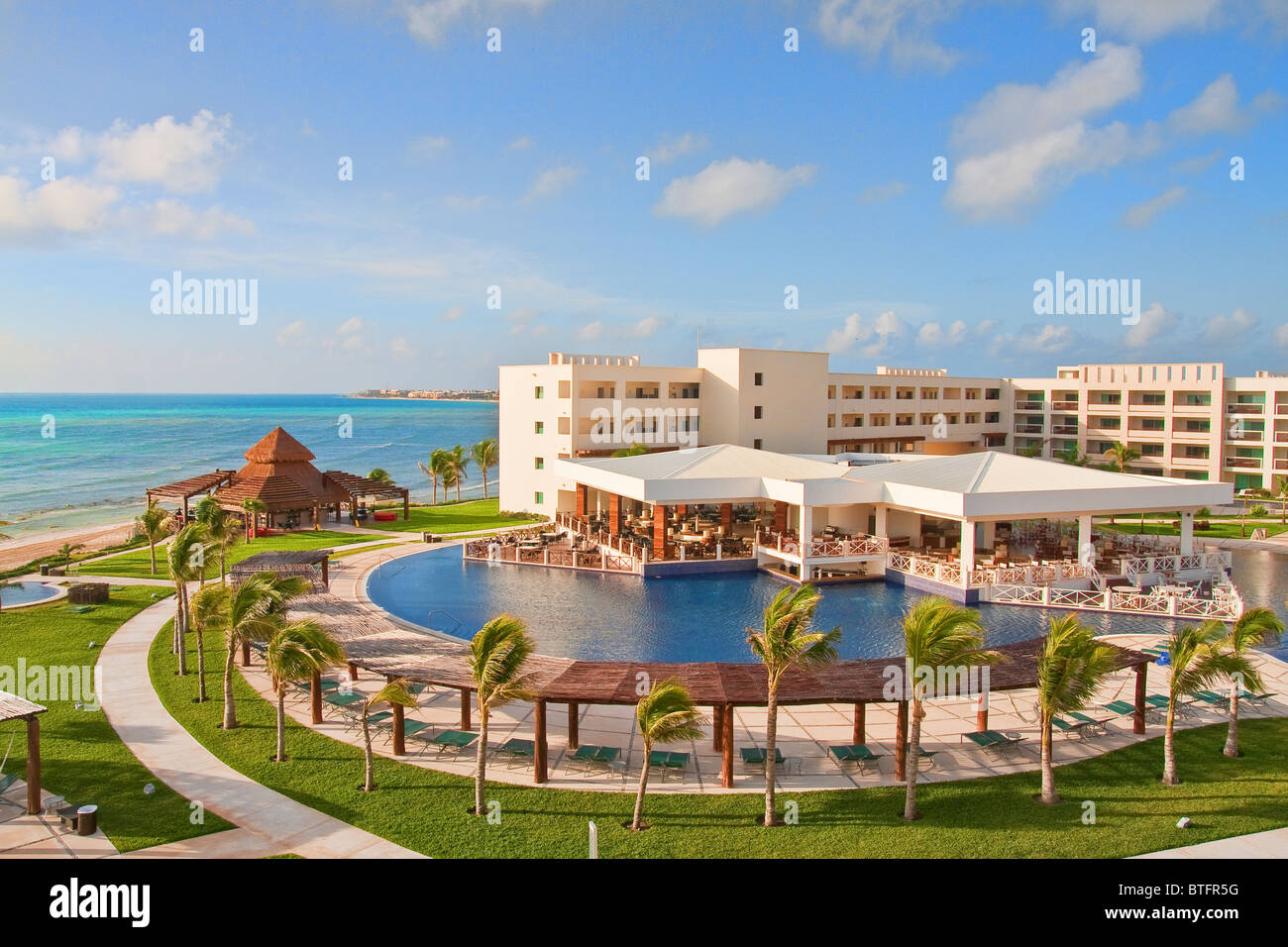 A view of a luxury resort hotel under nice skies Stock Photo - Alamy