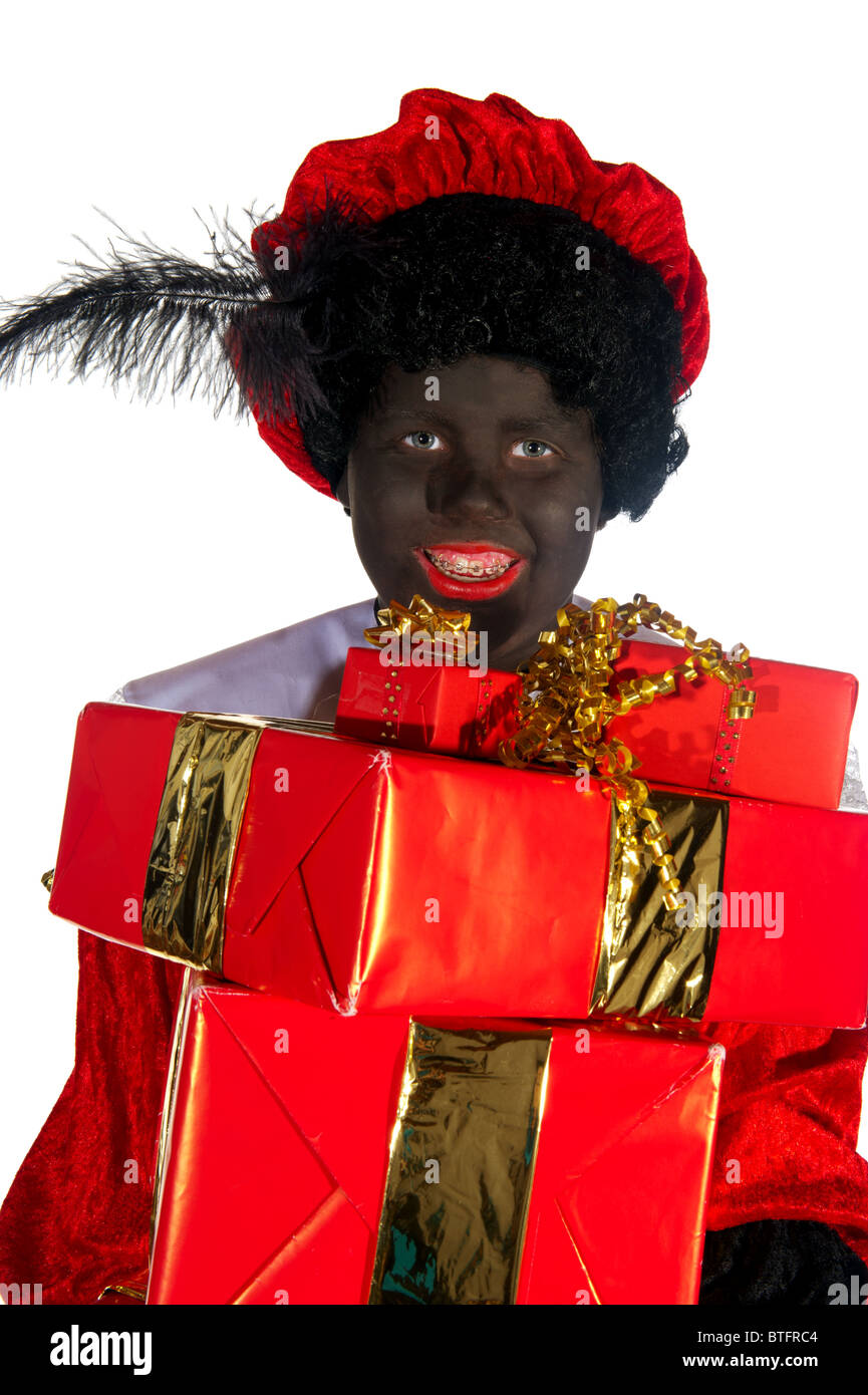 Black Piet is having lots of traditional Sinterklaas gifts Stock Photo ...